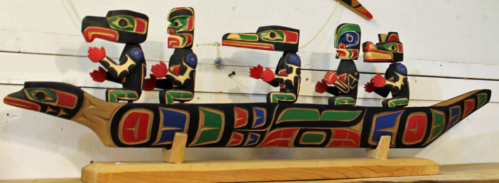 First Nations Canoe with Five Rowing Figures - Forest Gems Gallery